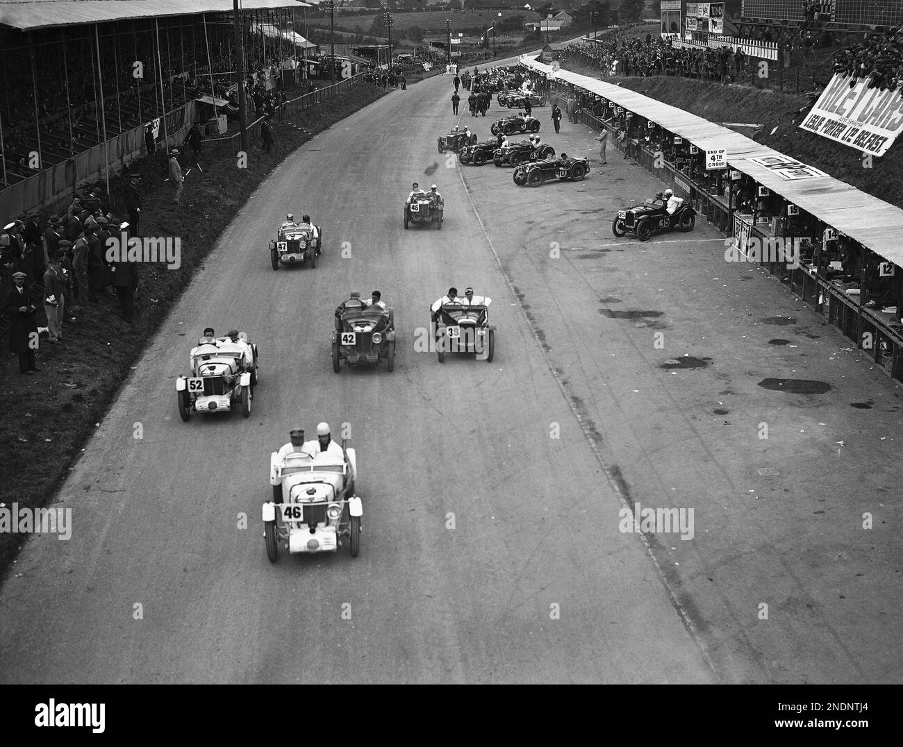 THe MG Midget team at the start of the Ulster Tourist Trophy race on ...