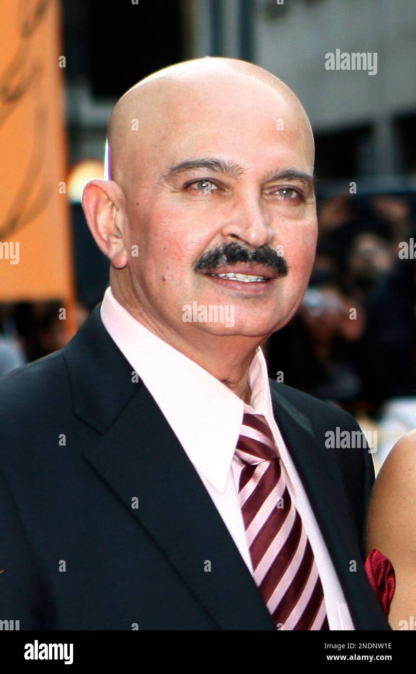 Indian producer Rakesh Roshan poses for the photographers as he arrives ...