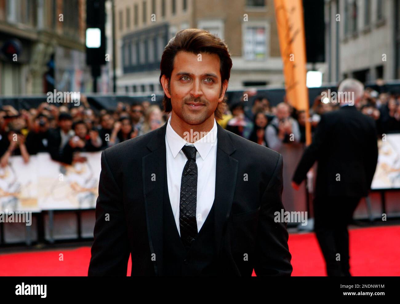 Actor Hrithik Roshan poses for the photographers as he arrives for the ...