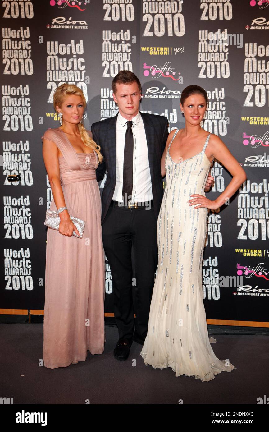From left, Barron Nicholas Hilton, Paris Hilton and Nicky Hilton attend ...