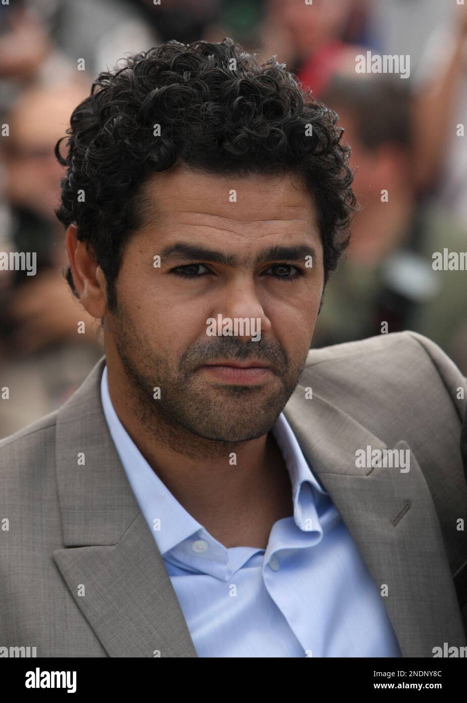 Actor Jamel Debbouze poses during a photo call for the film "Outside of ...