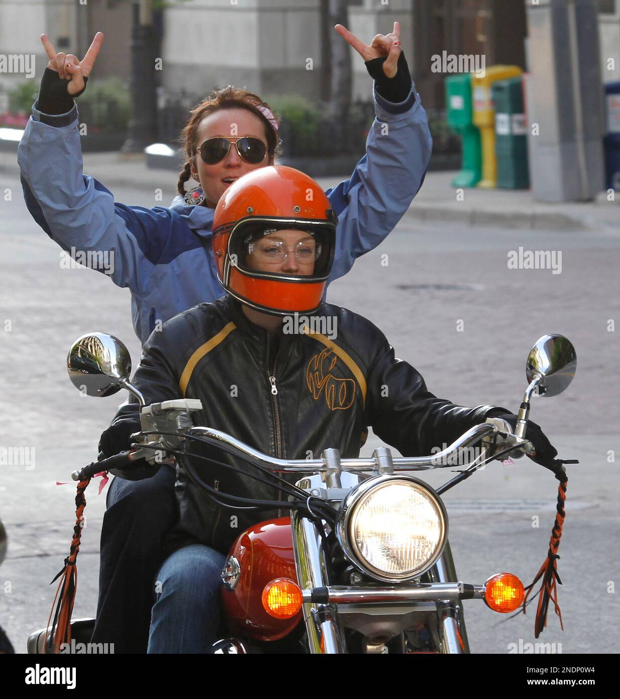 Woman rev their Harley-Davidson motorcycles in downtown Milwaukee ...