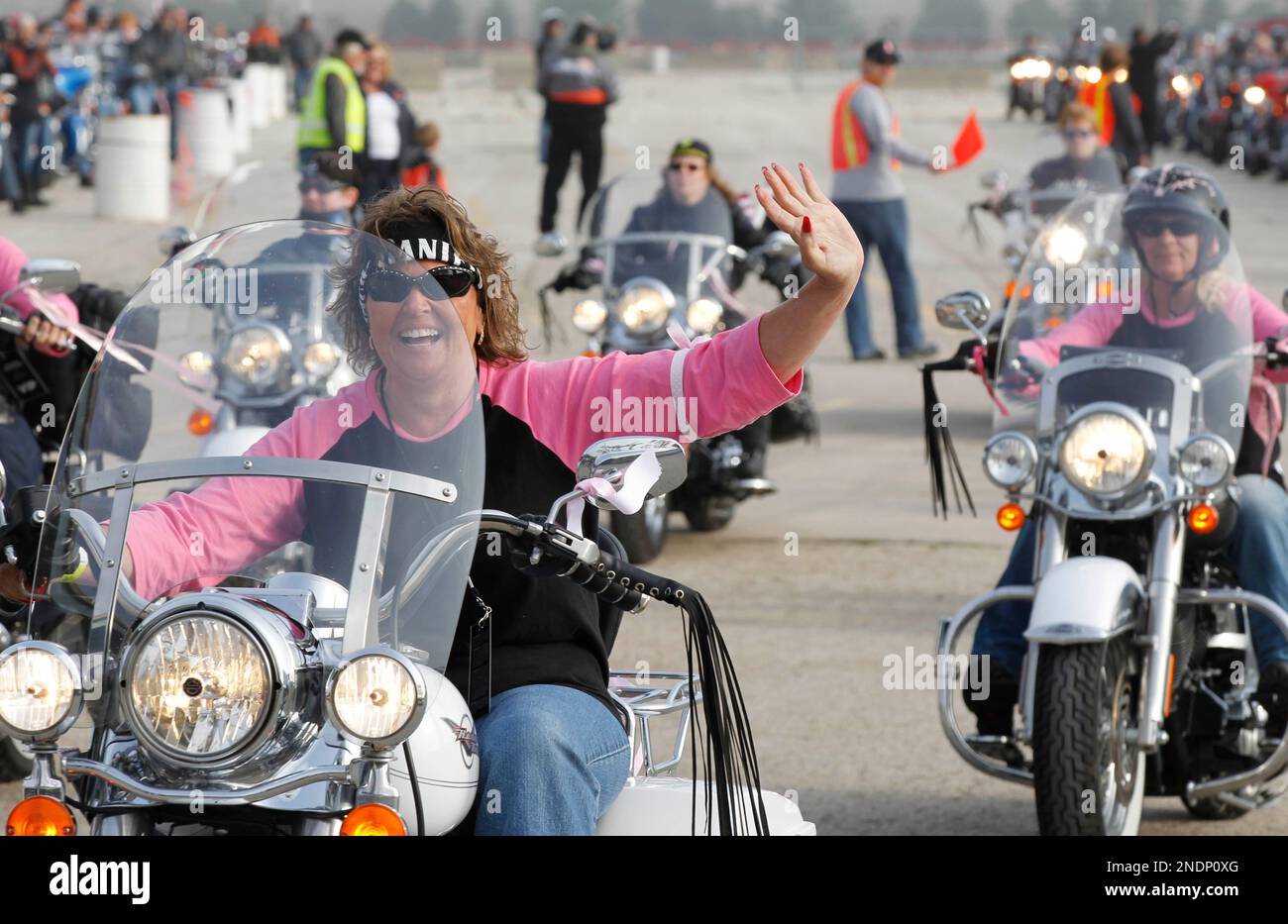Woman rev their Harley-Davidson motorcycles in downtown Milwaukee ...