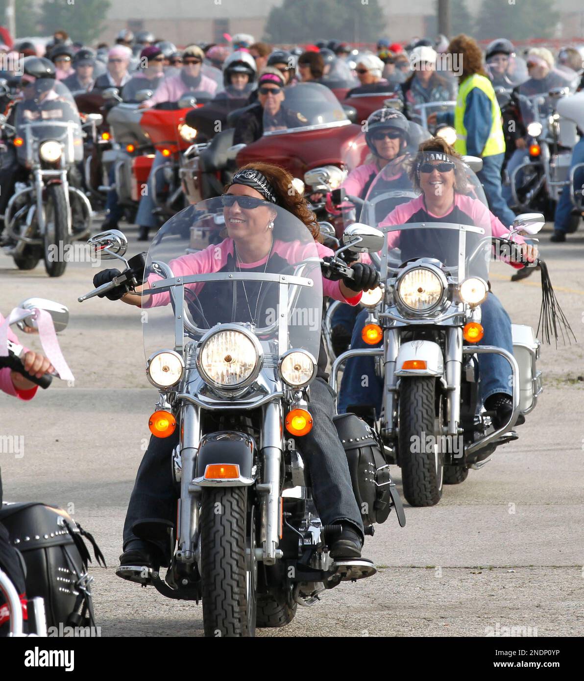Woman rev their Harley-Davidson motorcycles during a parade in ...