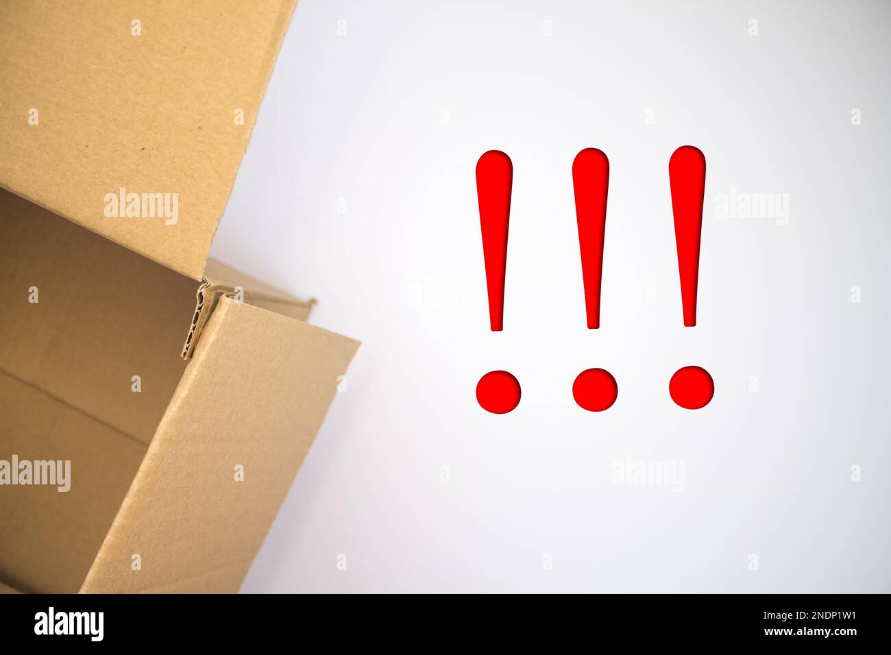 Exclamation mark word with cardboard box. Brown folded card box Stock ...