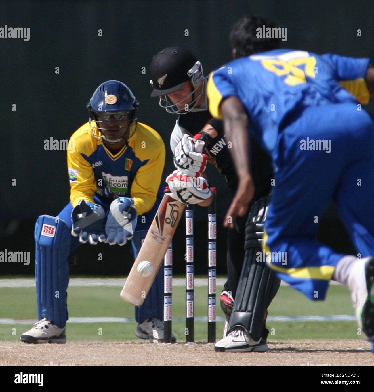 New Zealand's Brendon McCullum bats against Sri Lankan bowler Angelo ...