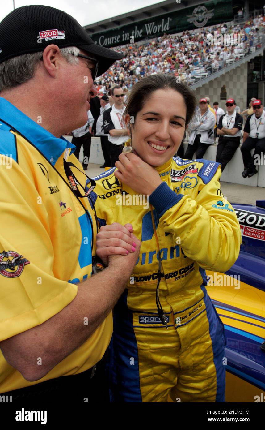 Ana Beatriz, of Brazil, is congratulated by a member of her crew after ...