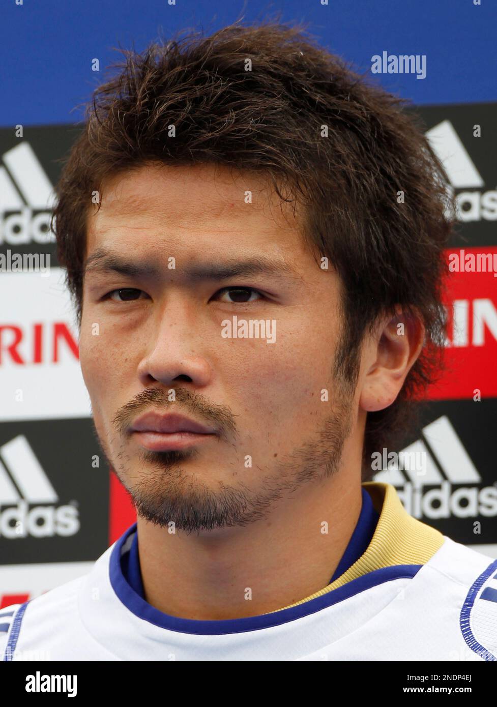 Japan's national soccer team player Daiki Iwamasa poses during a pre event for the 2010 World ...