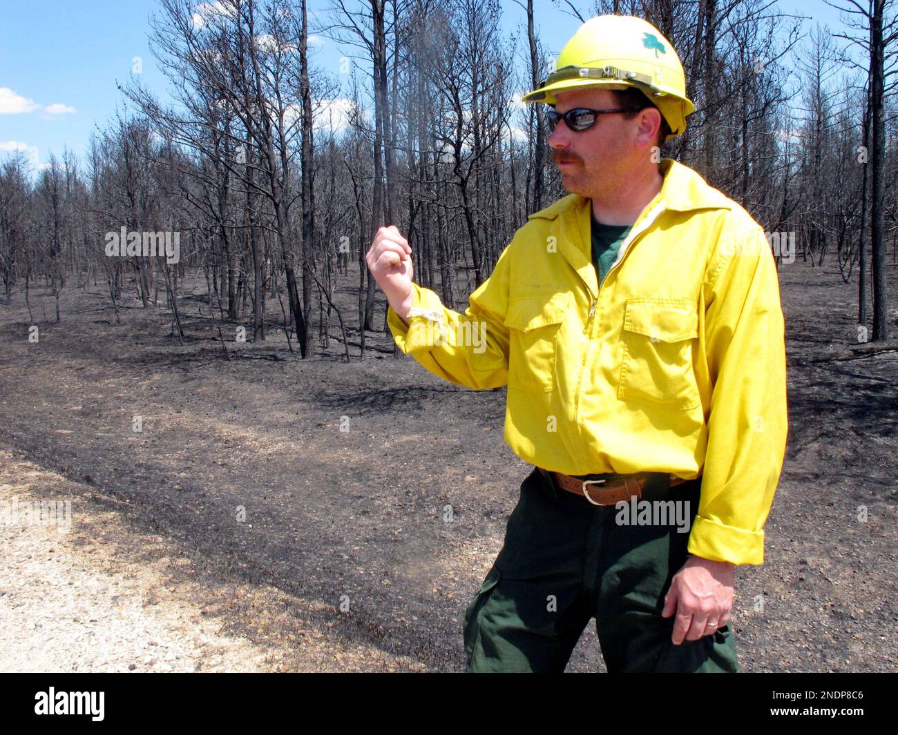 David Canning, a U.S. Forest Service supervisor, describes the path of ...