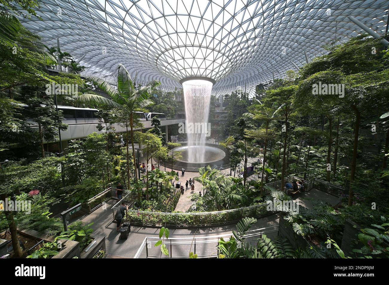 The Rain Vortex at Jewel Changi Airport, in terraced tropical forest ...