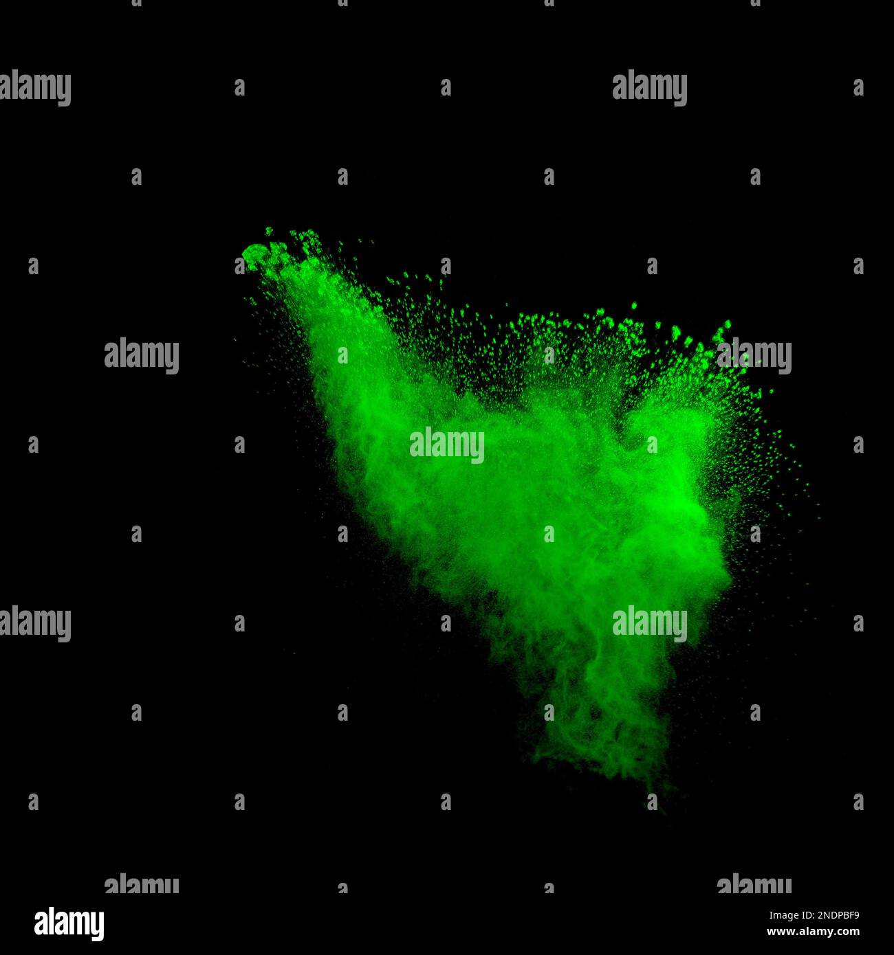 Green dust explosion on black background. Colored powder splatter on ...