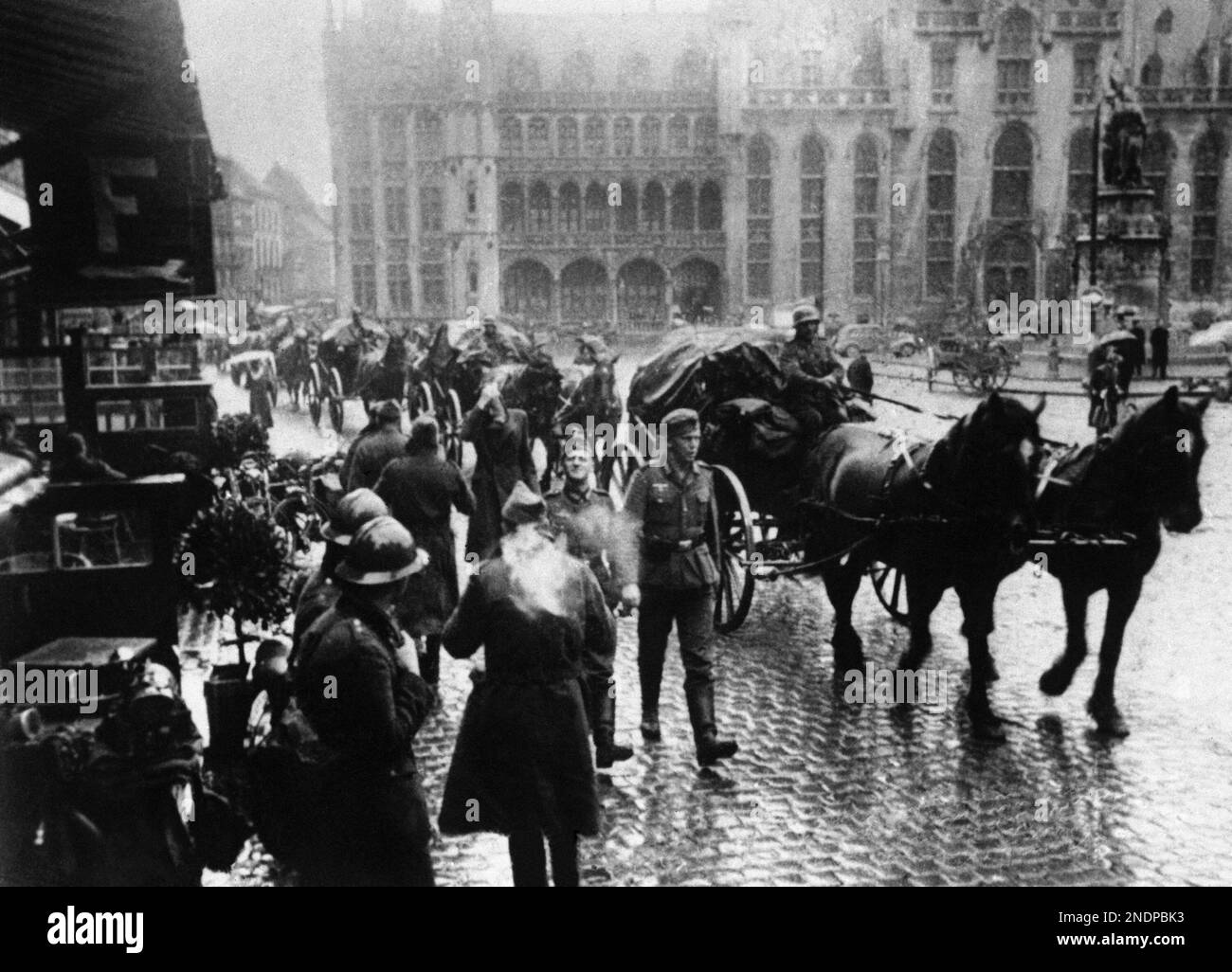 German troops marching into Bruges, Belgium on June 5, 1940, which was ...
