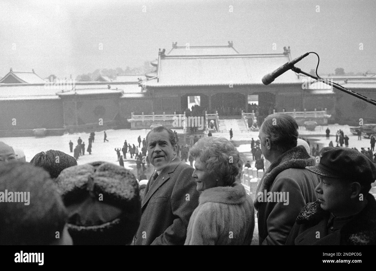 Snow swirls down around U.S. President Richard Nixon and his wife, Pat ...