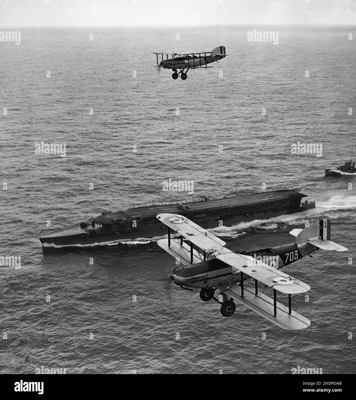 Planes flying over British aircraft carrier HMS Furious, in formation ...