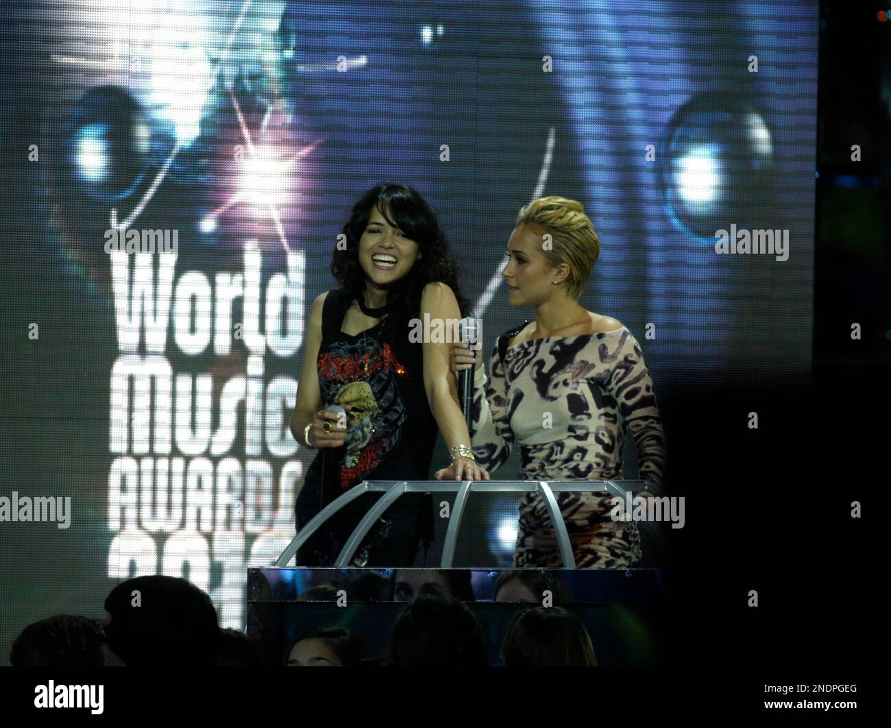 Hosts Michelle Rodriguez, left, and Hayden Panettiere on stage at the ...