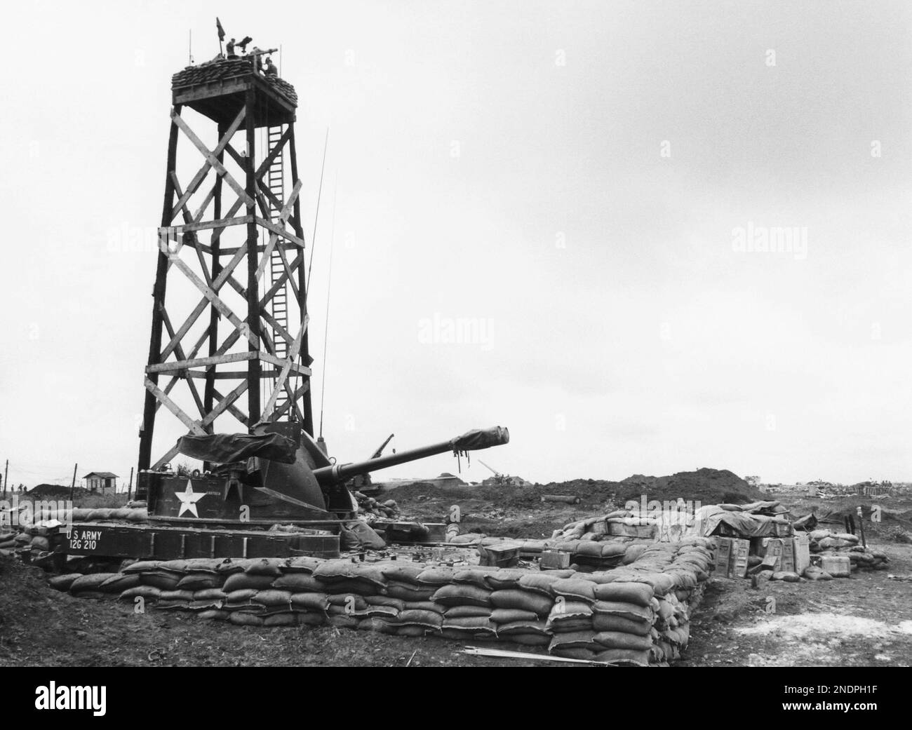 Marines watch from atop observation tower, where in clear weather, they ...
