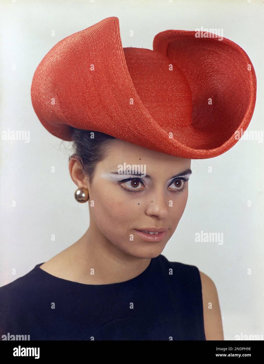 An Amazon-inspired hat of red Florence straw, by Cesare Canessa of Rome ...