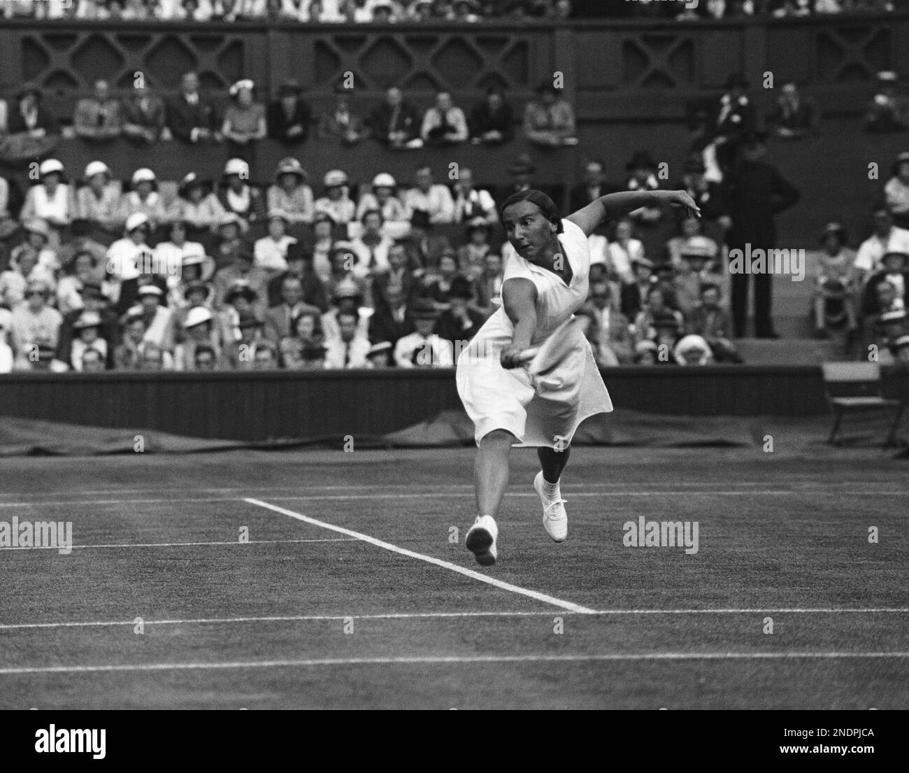 Tennis player Dorothy Round playing for England in the Wightman Cup ...
