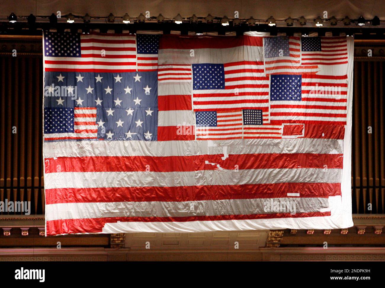 The National 9/11 flag is displayed during the Boston Pops world ...