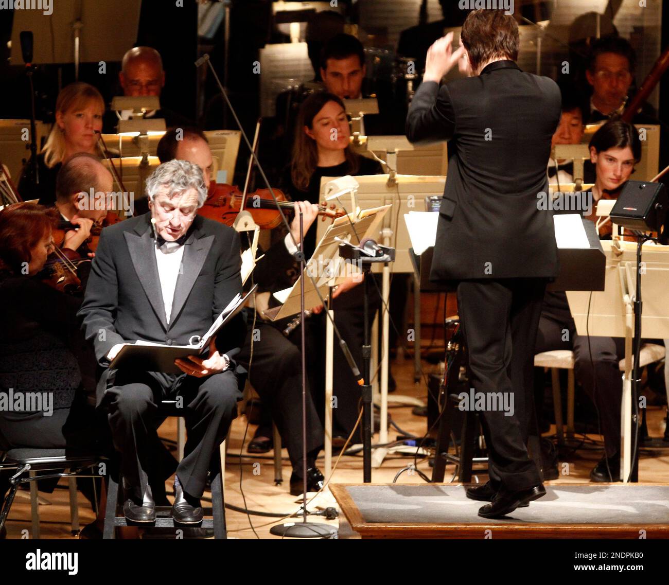 Robert De Niro, left, reads an excerpt as Keith Lockhart conducts the ...
