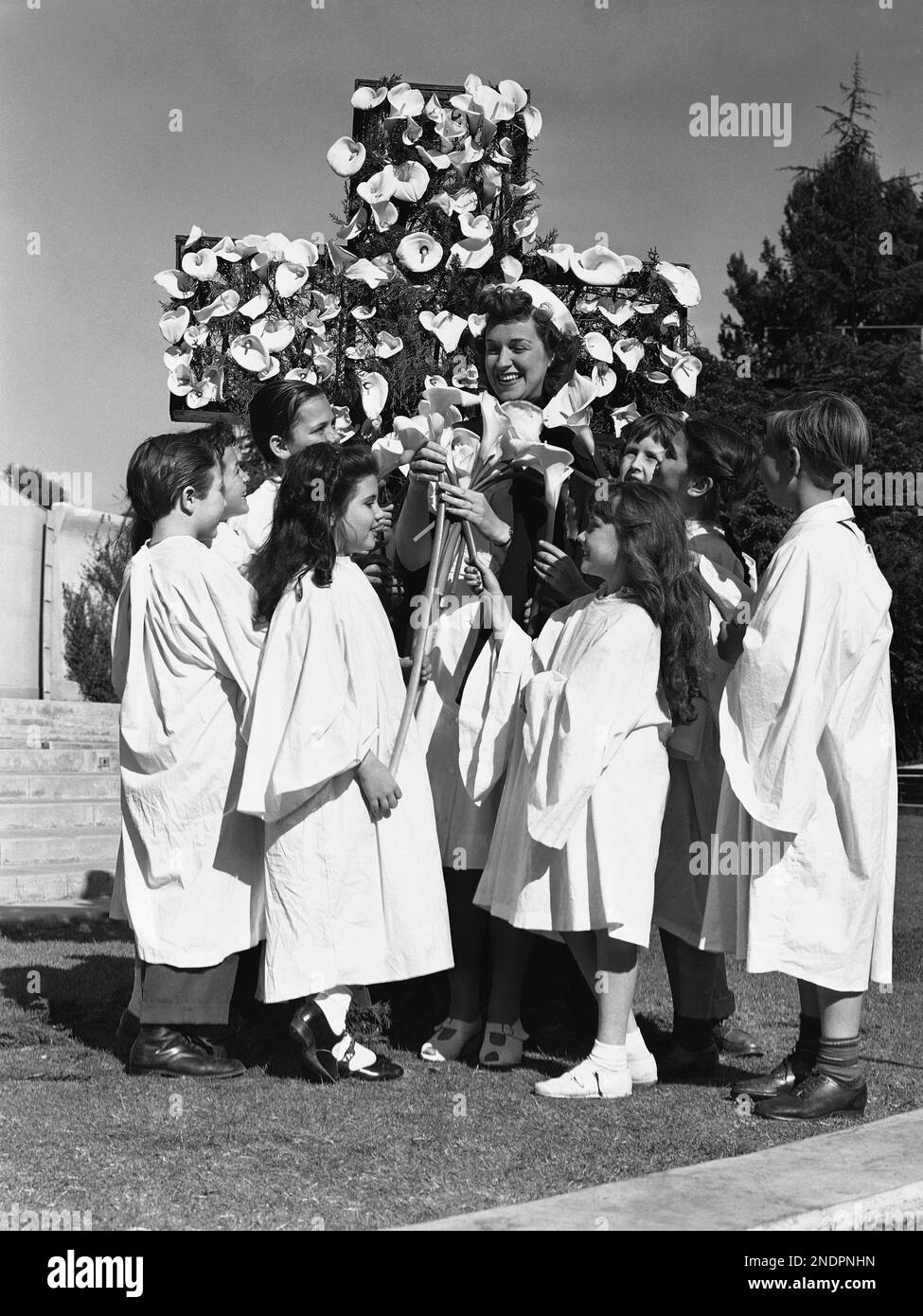 Rise Stevens, Metropolitan Opera singer, is surrounded by some of the ...