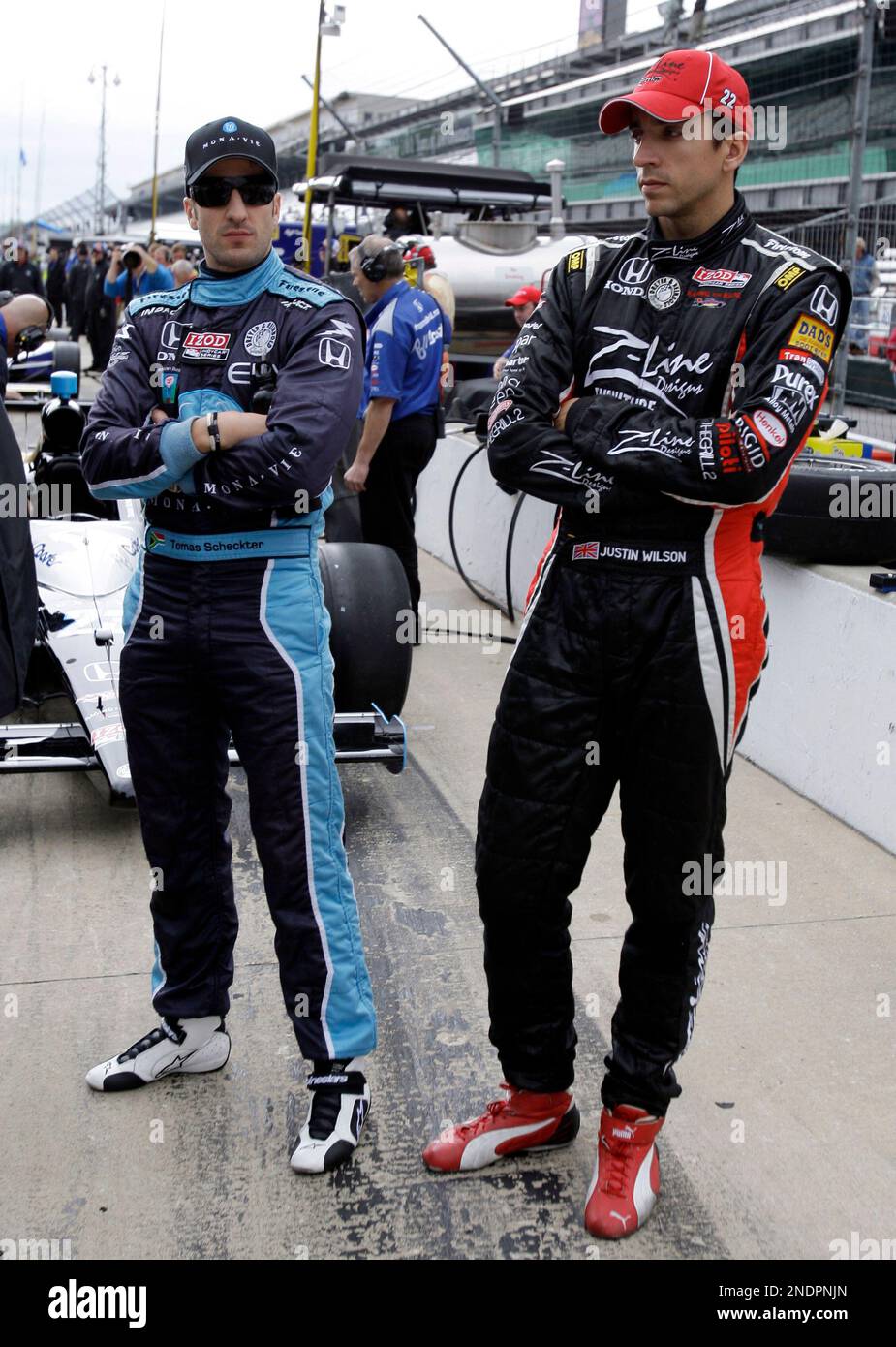 Tomas Scheckter, left, of South Africa, and Justin Wilson, of England ...