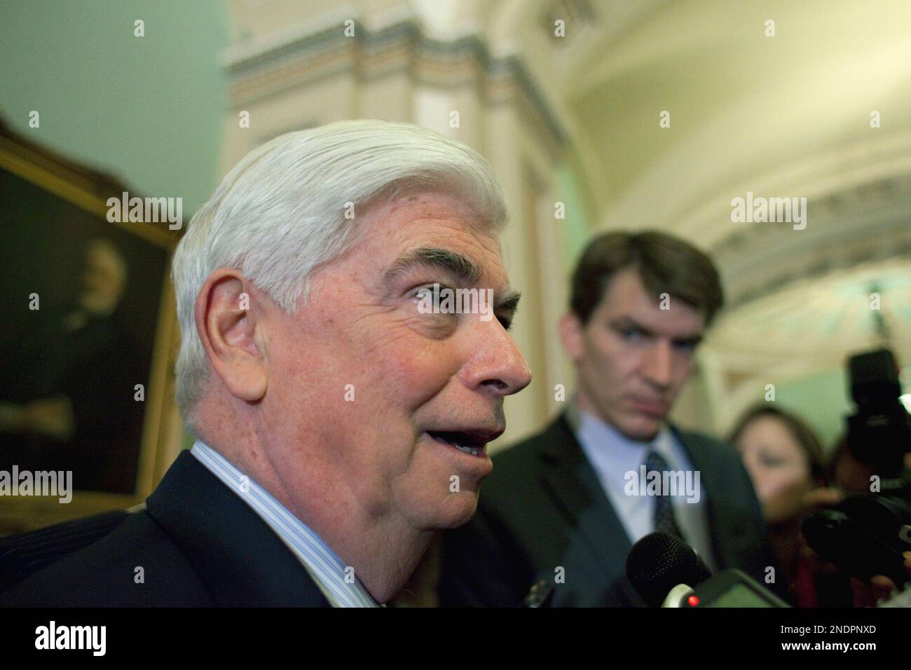 Sen. Christopher Dodd, D-Conn. talks to reporters outside of the Senate ...