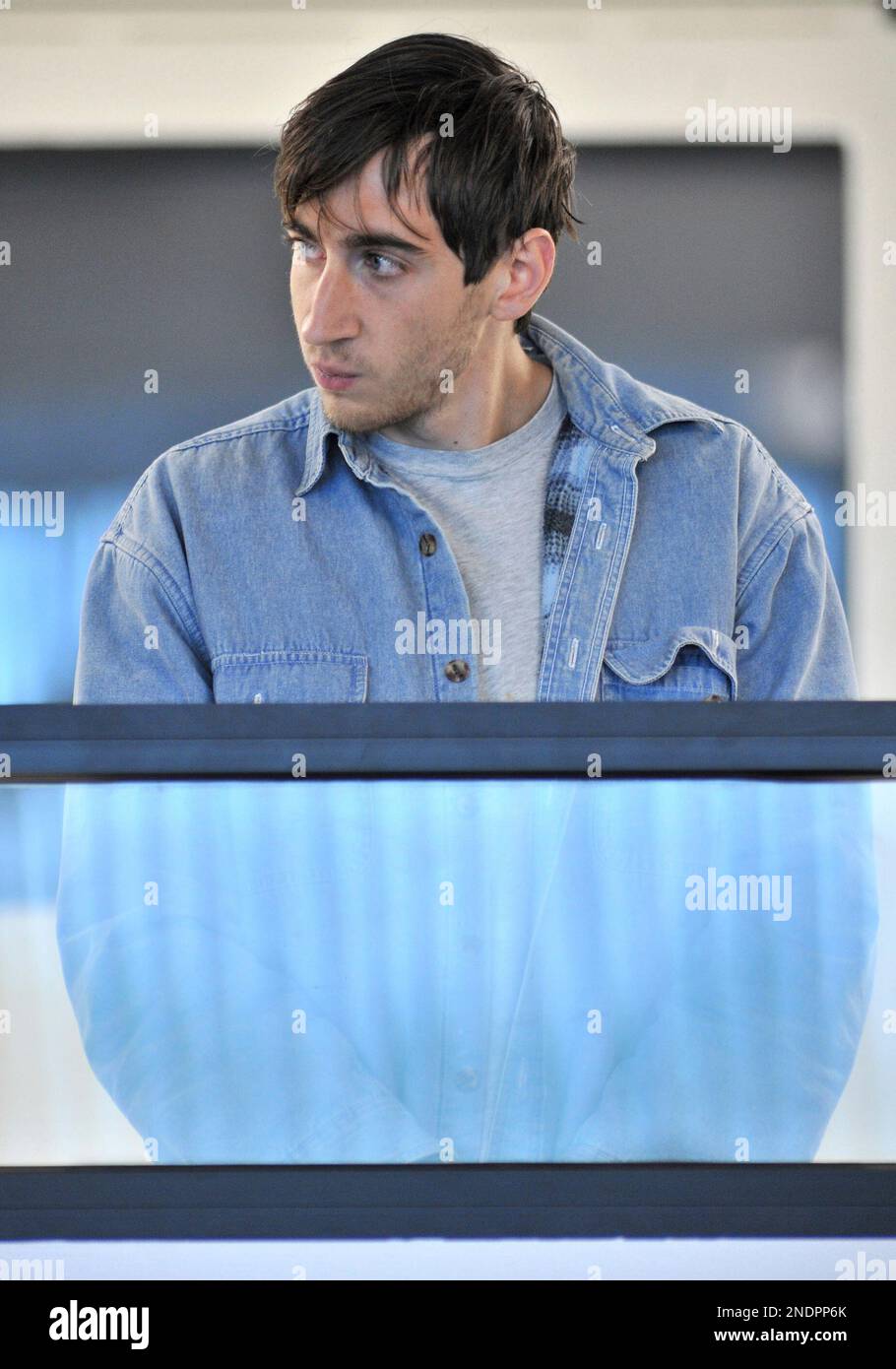 Adam Wheeler, of Milton, Del., appears at his arraignment in Woburn ...