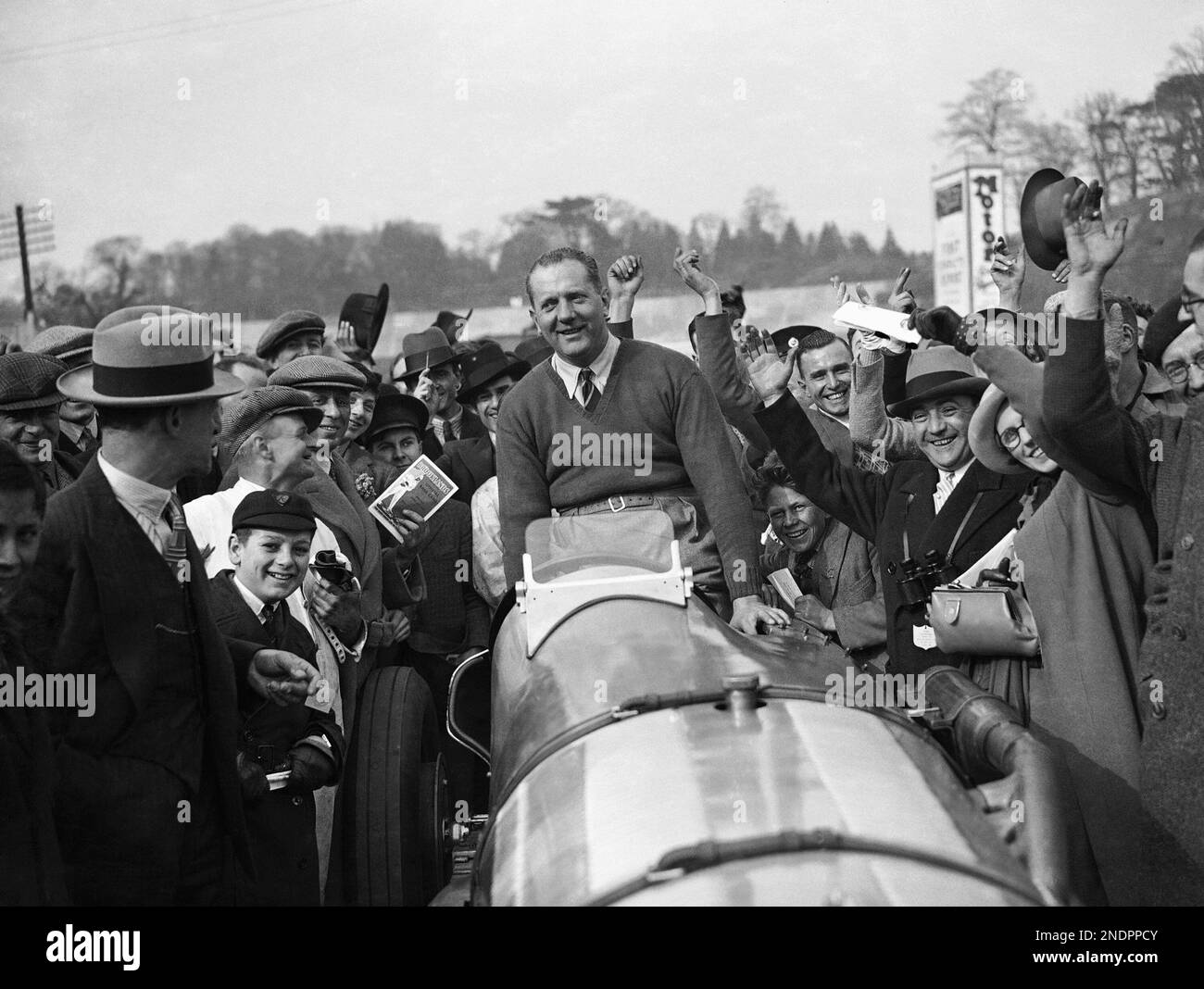 British motor racer John Cobb, after driving his Giant 12 Cylinder ...