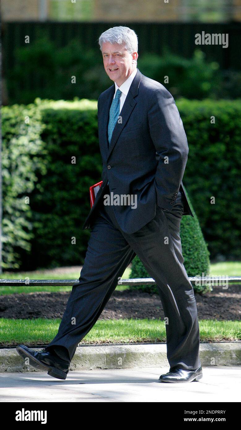 Britain's Secretary of State for Health Andrew Lansley arrives for a ...