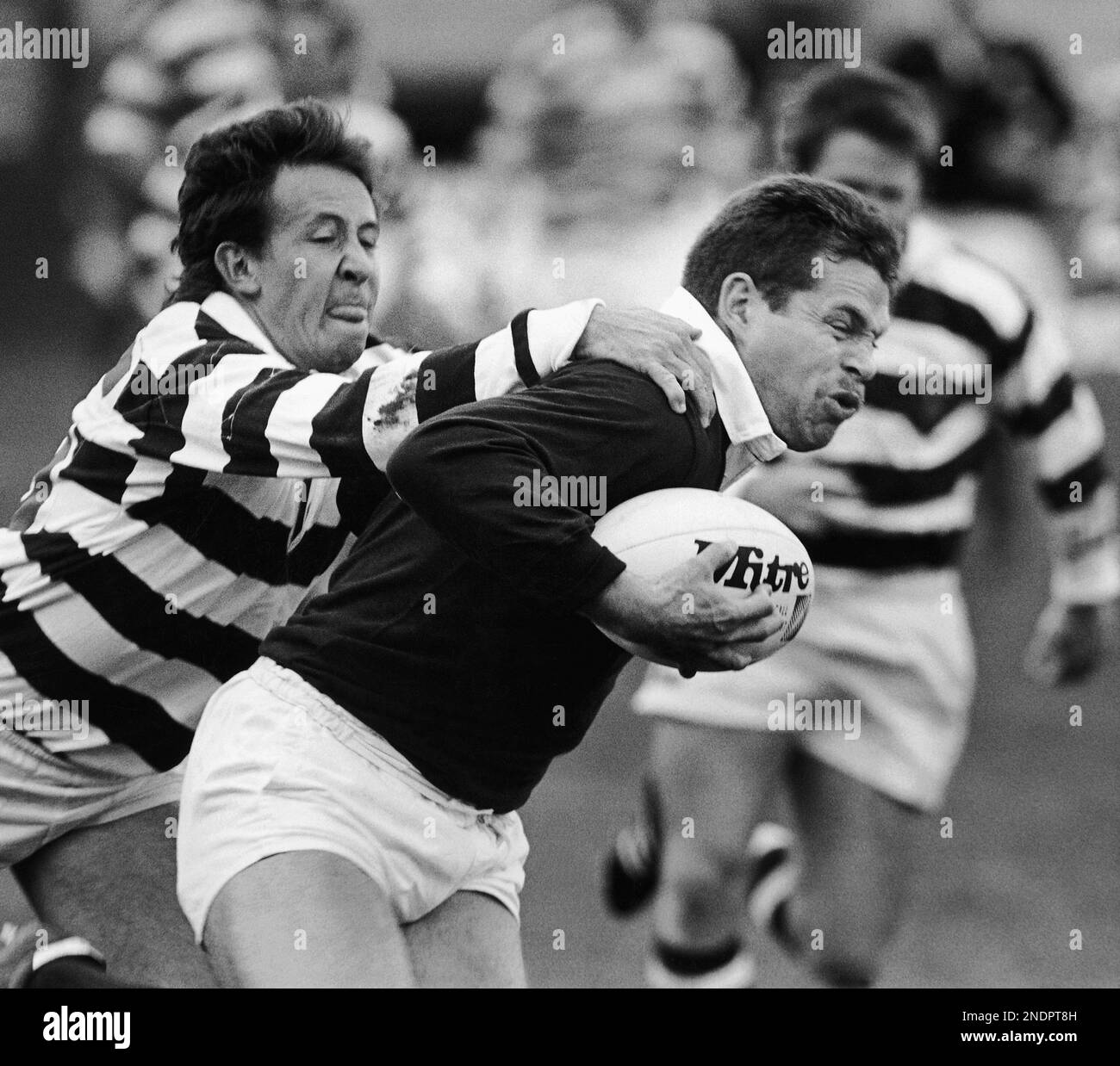 Scotland's Matt Duncan heads for the try line despite the efforts of ...