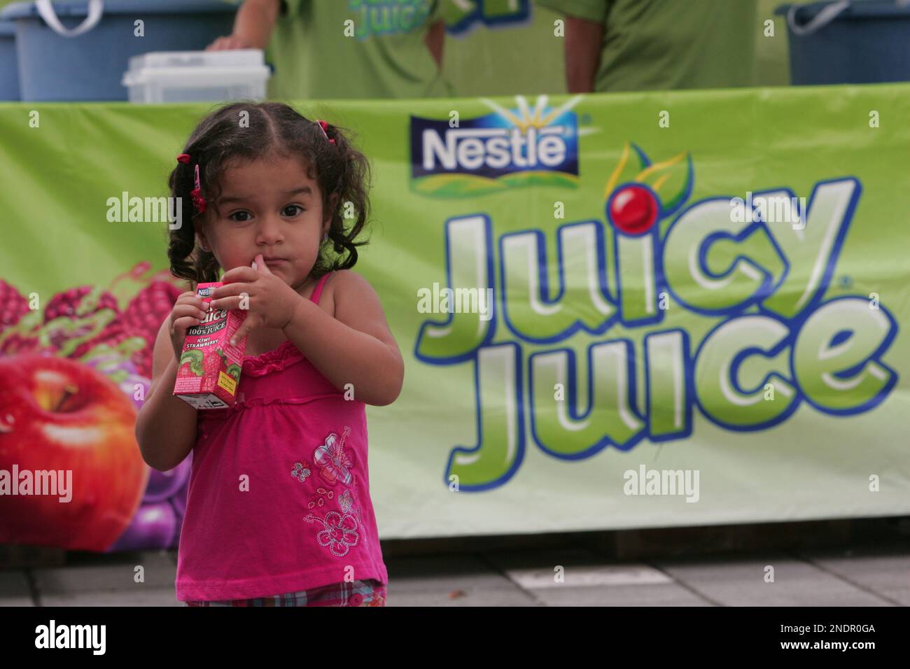 Nicole Forestieri, 2, drinks her Juicy Juice during the Nestle Juicy ...