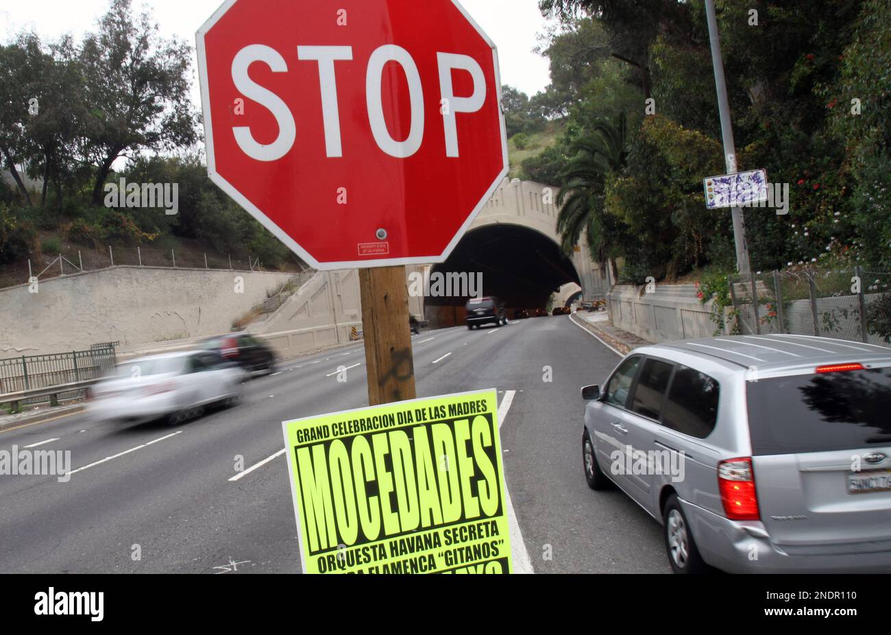 A car waits at a stop sign to enter the Pasadena (110) Freeway on ...