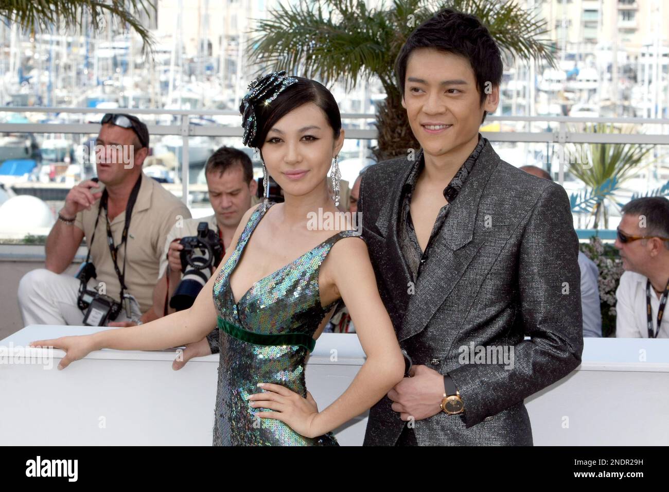 Actress Li Feier and actor Zi Yi pose during a photo call for ...