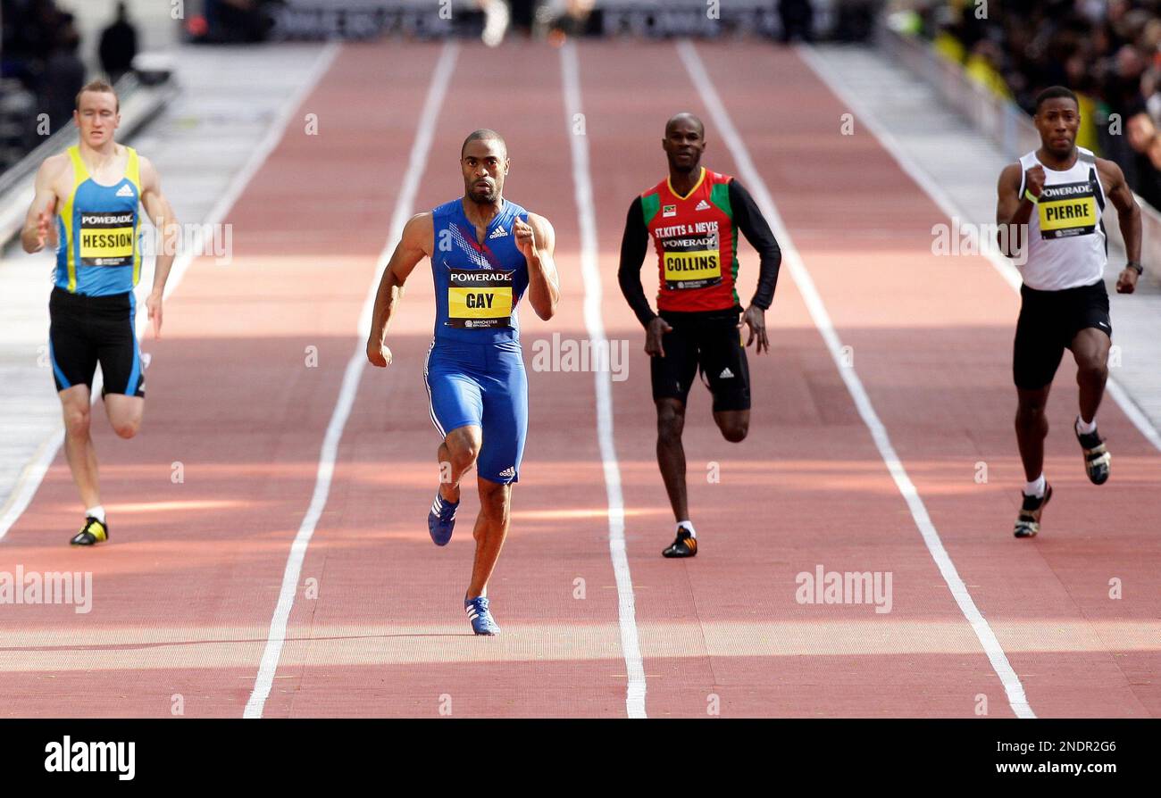 American athlete Tyson Gay, second left, wins the Men's 200m in a time ...