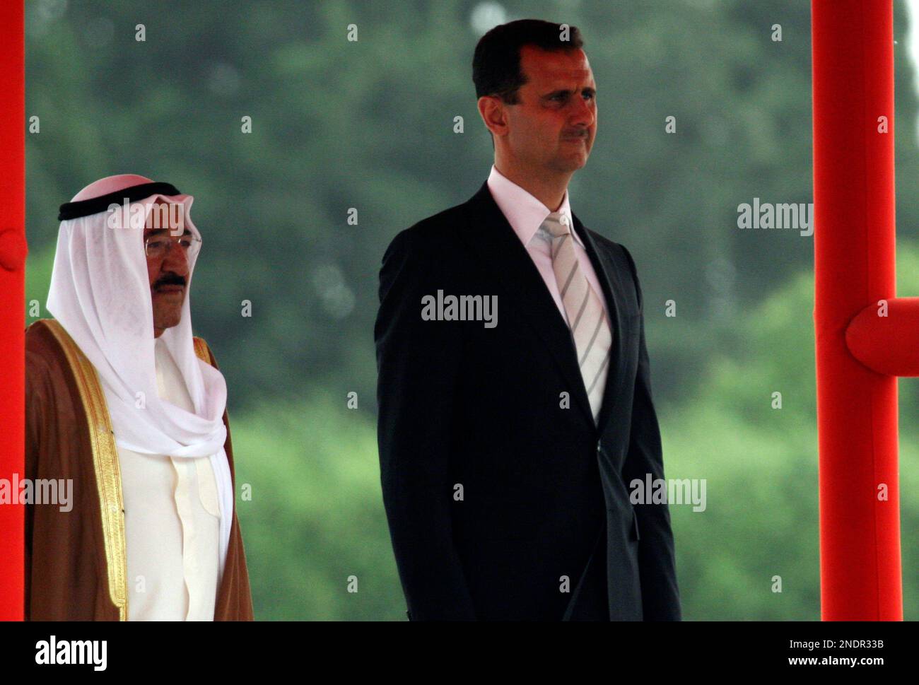Syrian President Bashar Assad,right, and Emir of Kuwait Sheikh Sabah Al ...