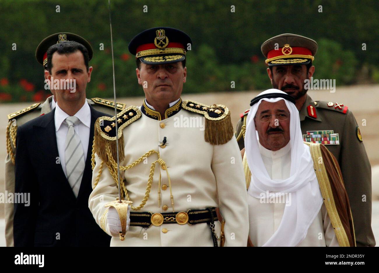 Syrian President Bashar Assad,left , and Emir of Kuwait Sheikh Sabah Al ...