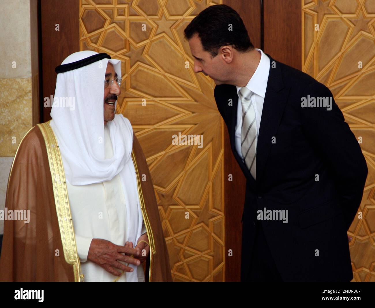 Syrian President Bashar Assad,right, meets with Emir of Kuwait Sheikh ...