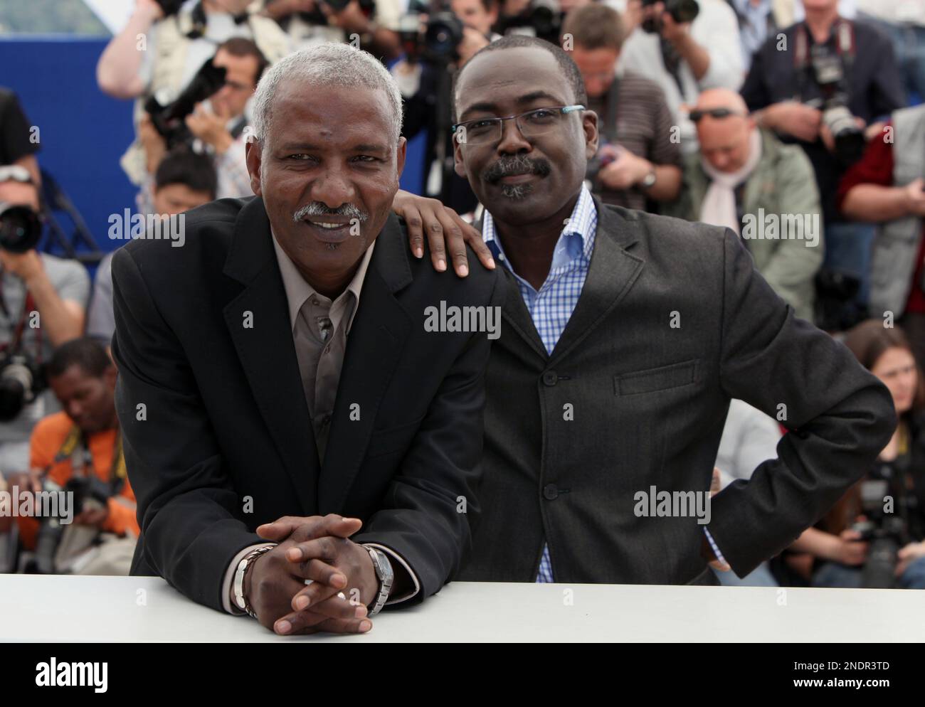 Actor Youssouf Djaoro and director Mahamat-Saleh Haroun pose during a ...