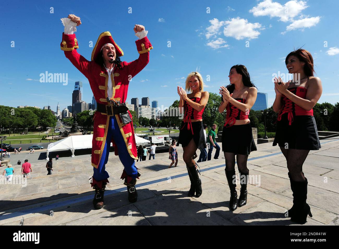 Captain Morgan and the Morganettes pose on the steps of the ...