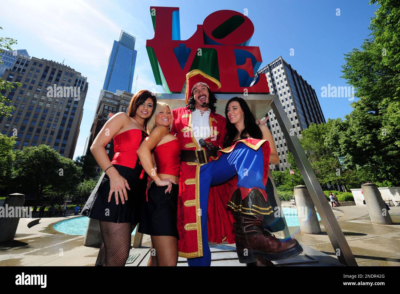 Captain Morgan and the Morganettes pose in front of the "Love ...
