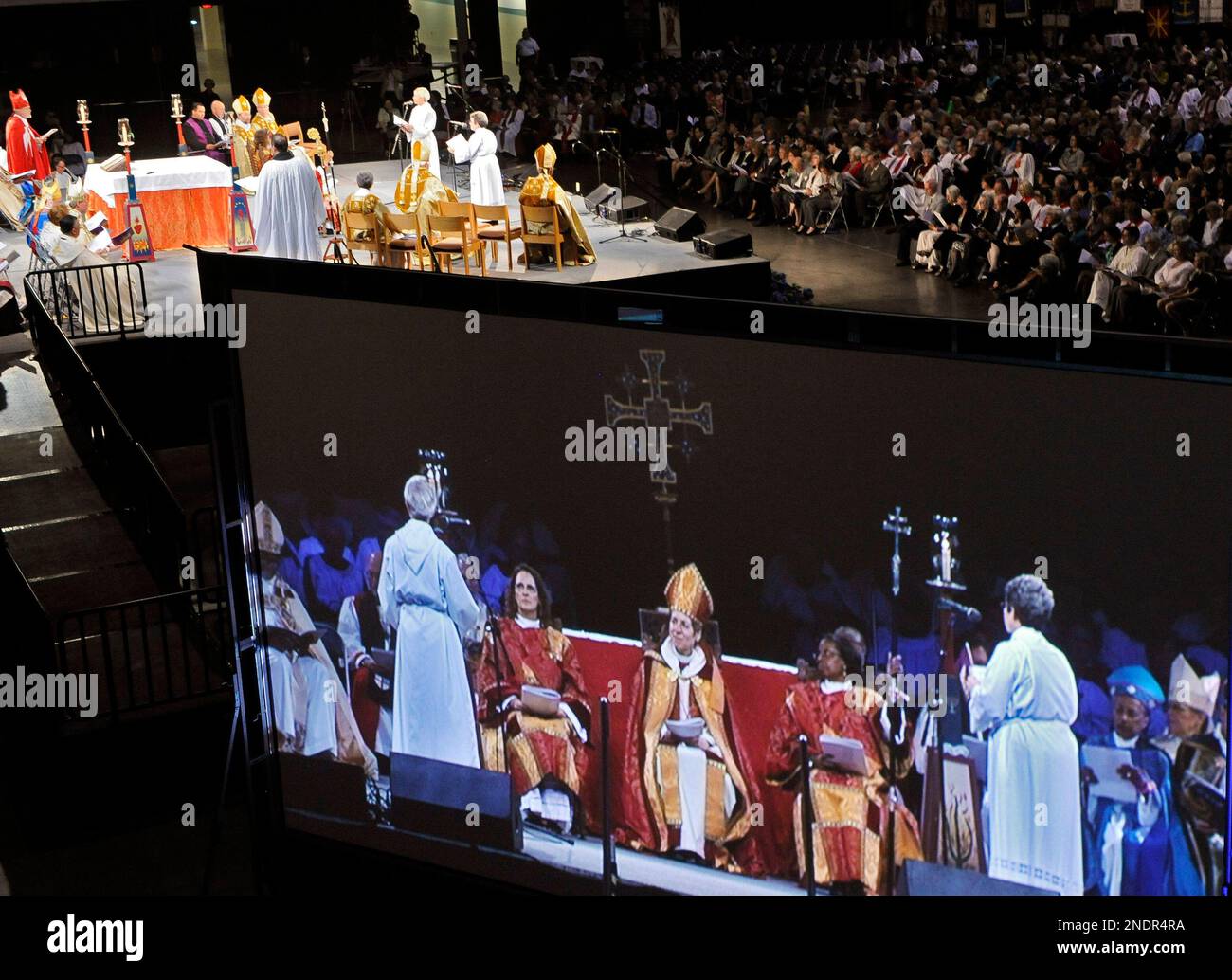 A video screen, below, shows Rev. Canon Mary Glasspool, left, and Rev ...