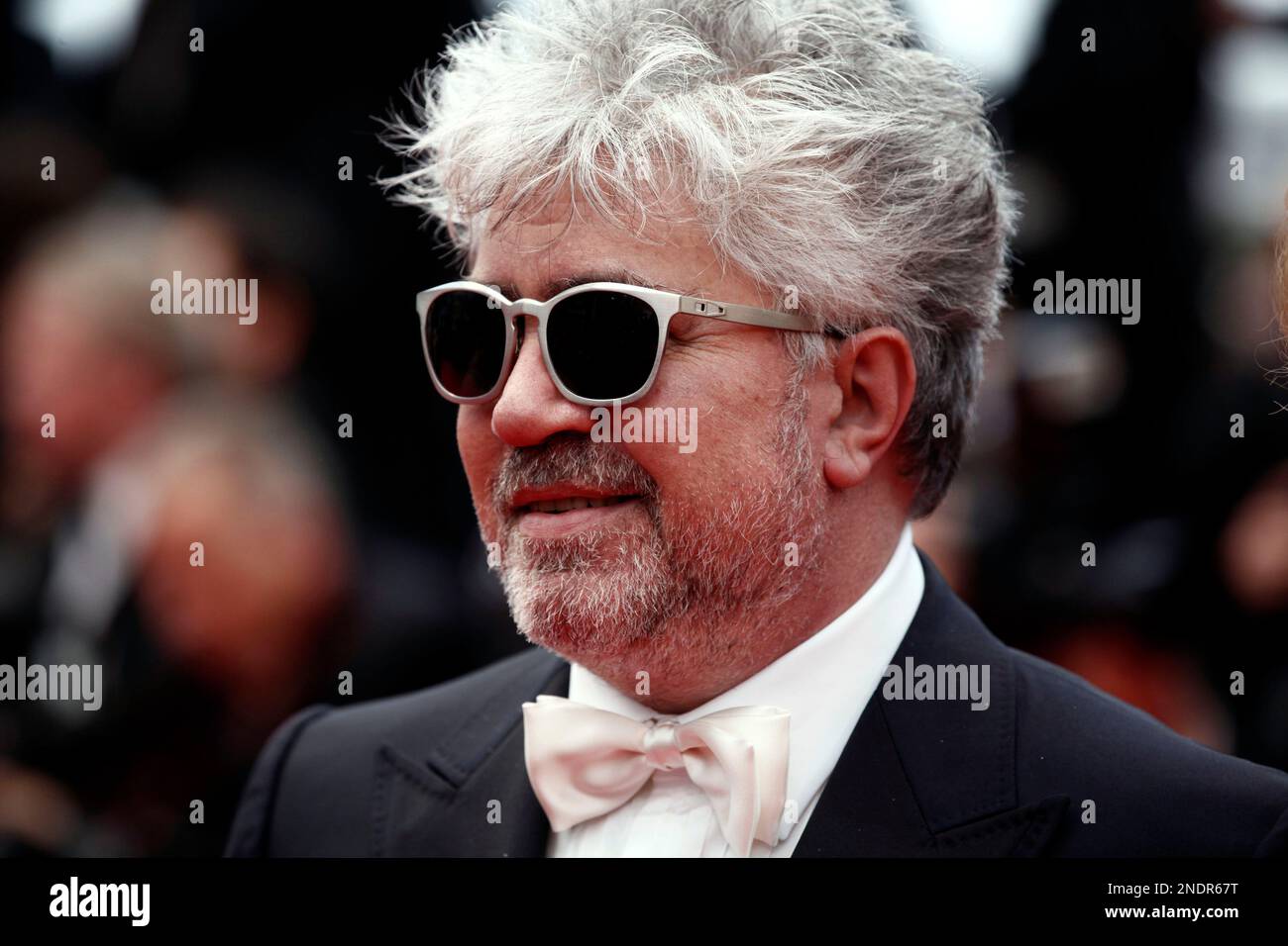 Filmmaker Pedro Almodovar arrives for the premiere of "You Will Meet a ...