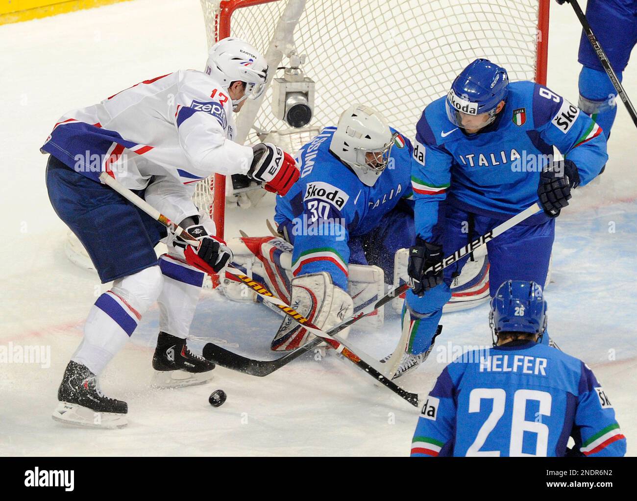 Italy's goalkeeper Daniel Bellissimo, center, and Giogio de Bettini ...
