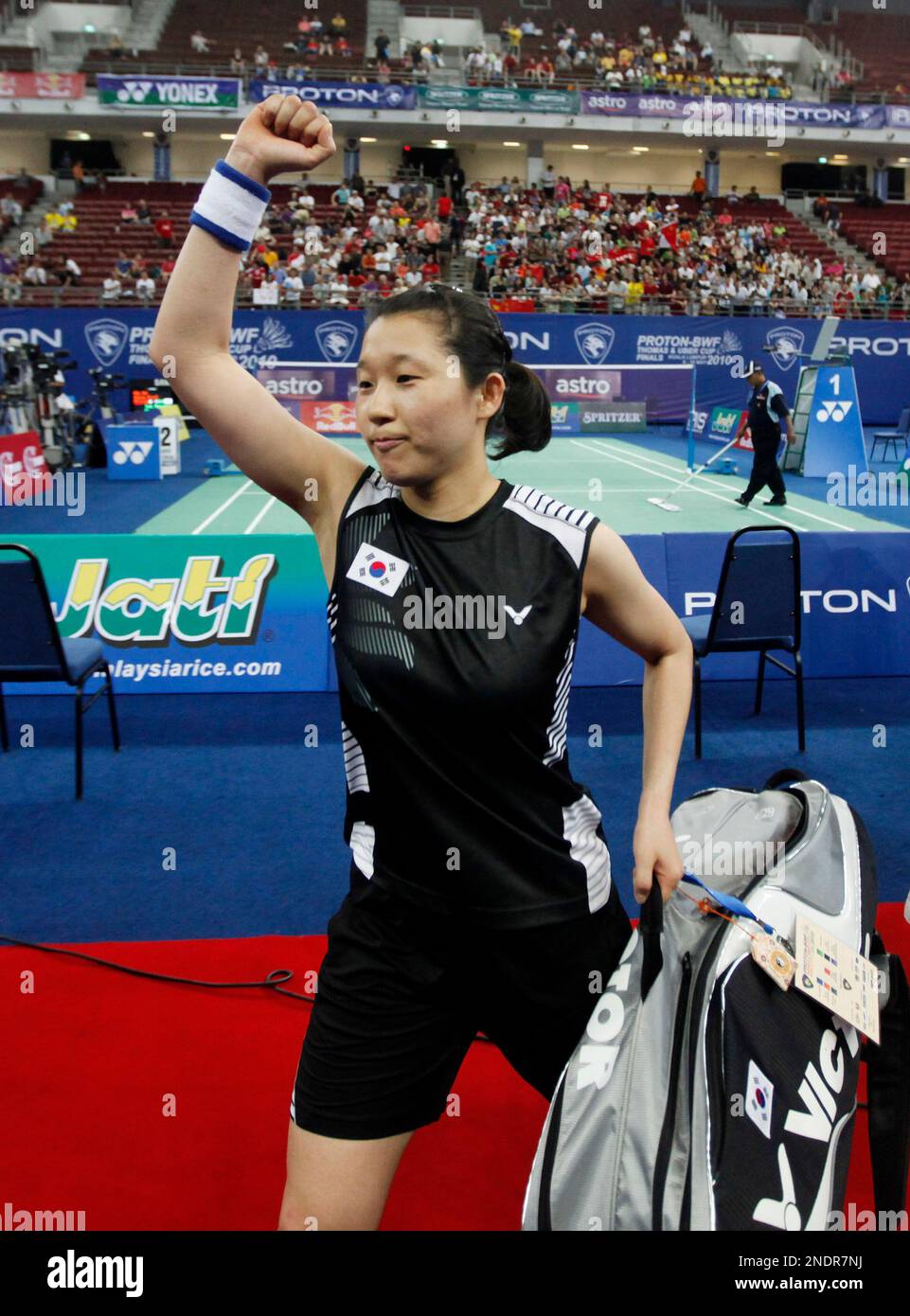 South Korea's Bae Seung-hee waves as she leaves the court after ...