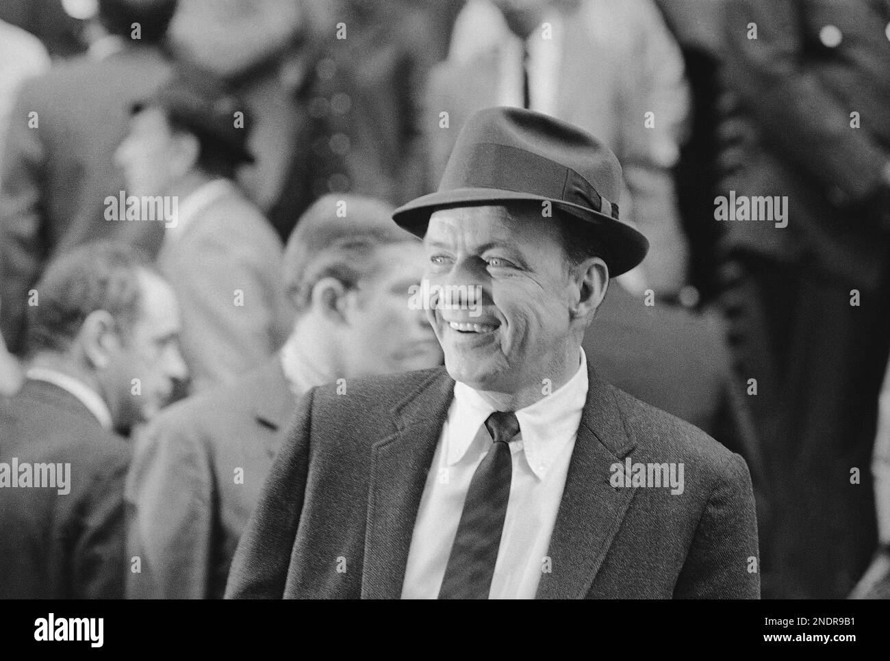 Frank Sinatra plays the title role in the film "The Detective," outside ...