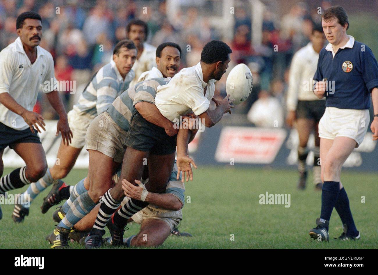 Two Argentinians attempt to stop a Fijian forward during the Rugby ...