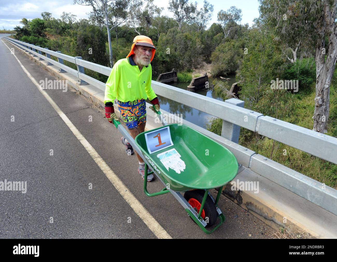 74 years old Jon Booth, known as the "Chillagoe Fossil," pushes a ...