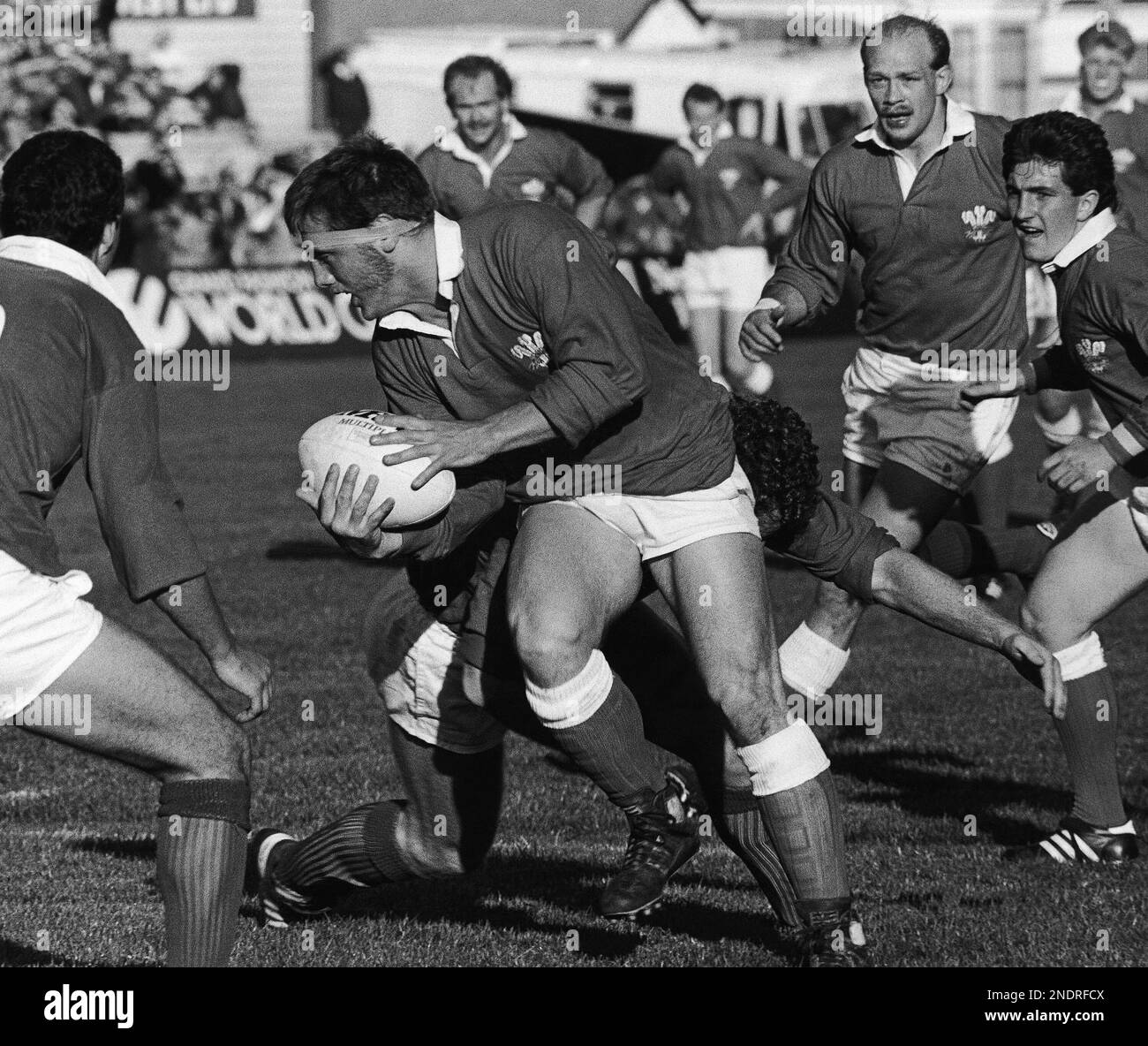 Welsh hooker Kevin Phillips steps out of the tackle of Irelands Phillip ...