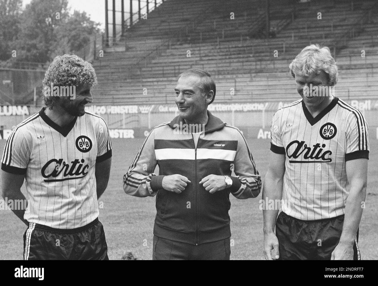 The new trainer of BV Borussia Dortmund, Pal Csernai, center, laughs ...